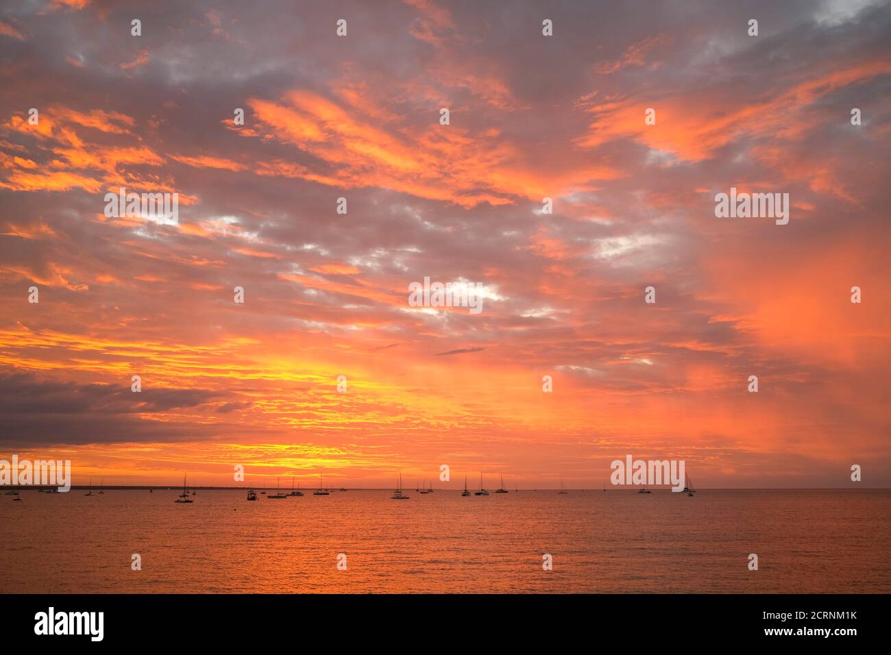 Moored sailing boats and yachts, in Darwin Harbour at sunset. Darwin ...