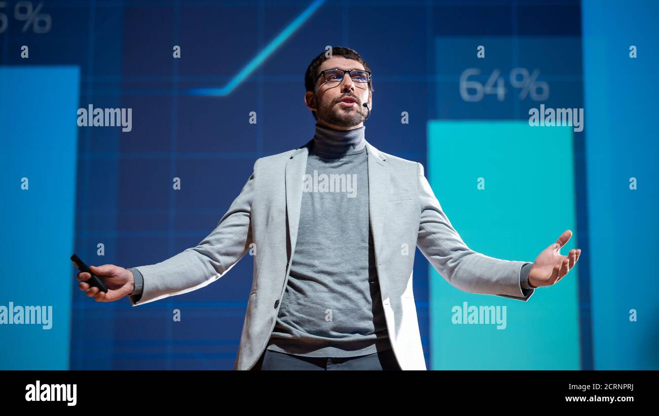 On-Stage Speaker Greets Audience, Presentation of Technological Device ...