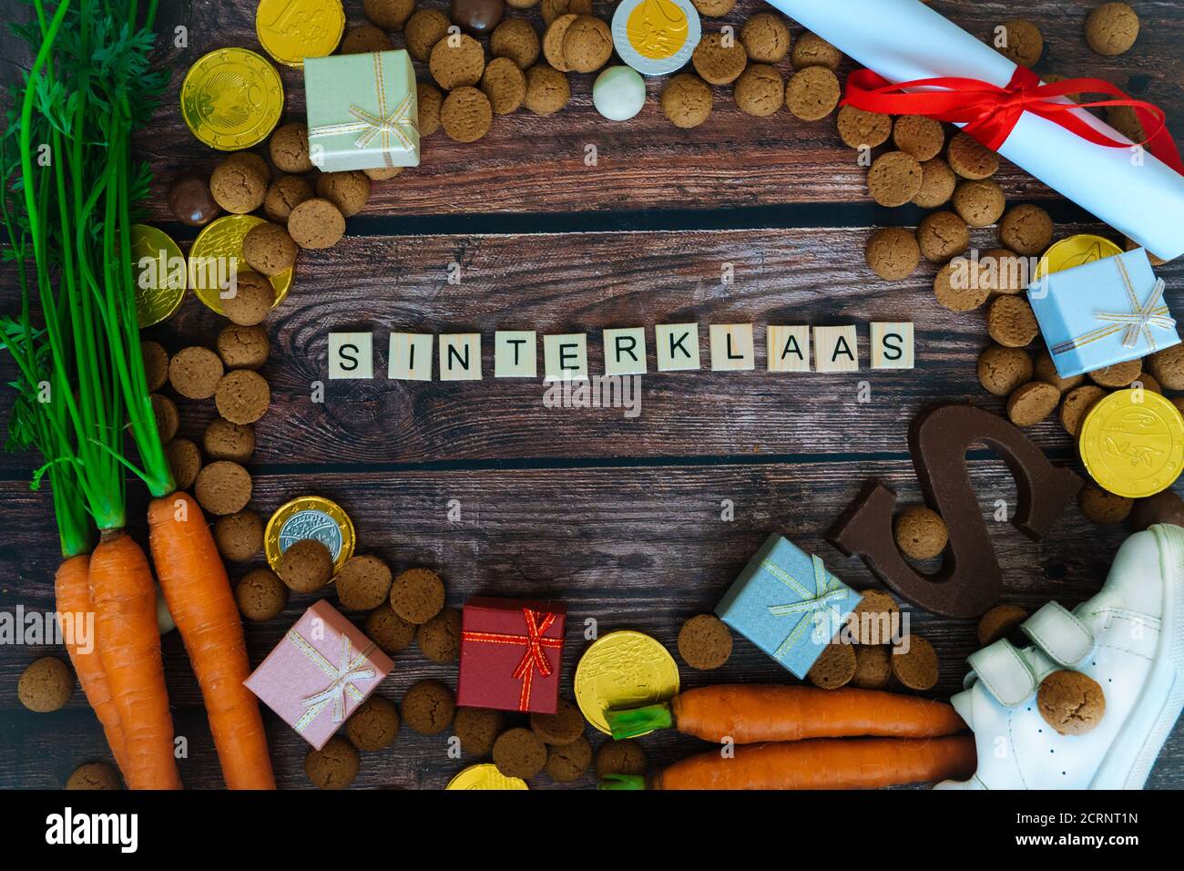 Dutch holiday Sinterklaas background with children shoe, carrots for ...