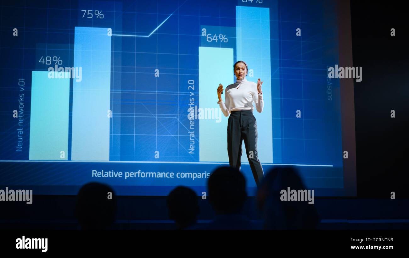 On Stage, Successful Female Speaker Presents Technological Product ...