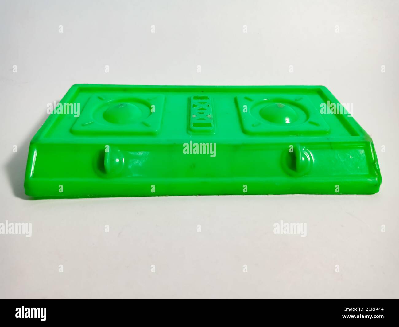 Green cooking stove toy isolated on white background for marketing and ...