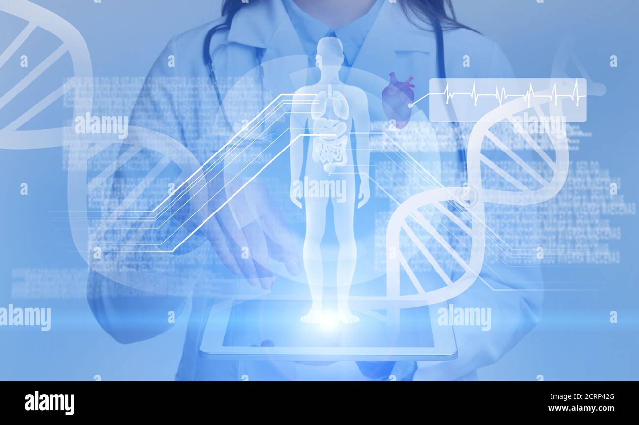 Electronic medical record. Female doctor in white coat holding tablet ...