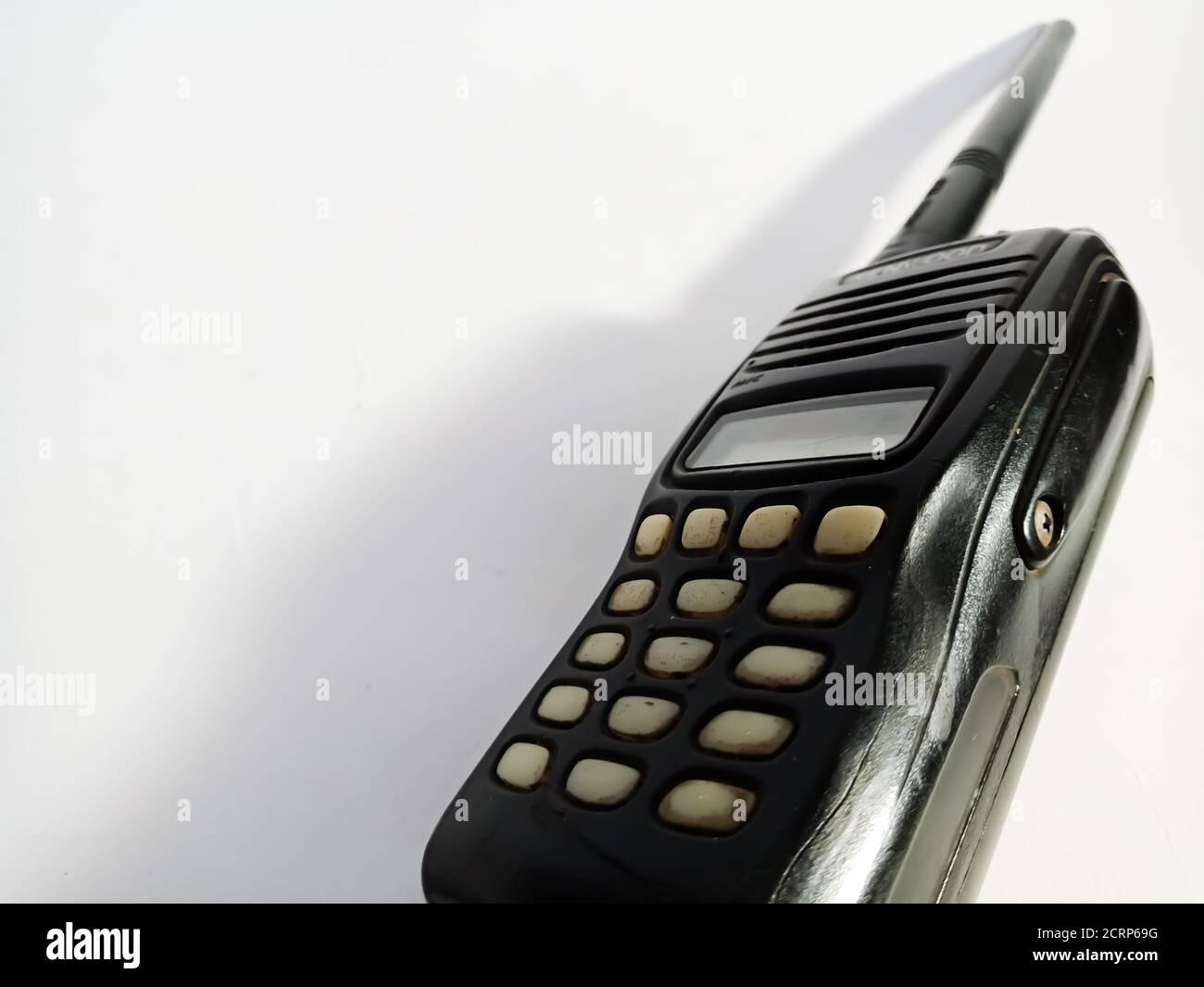 handy talky communication tool that uses frequency on white background ...