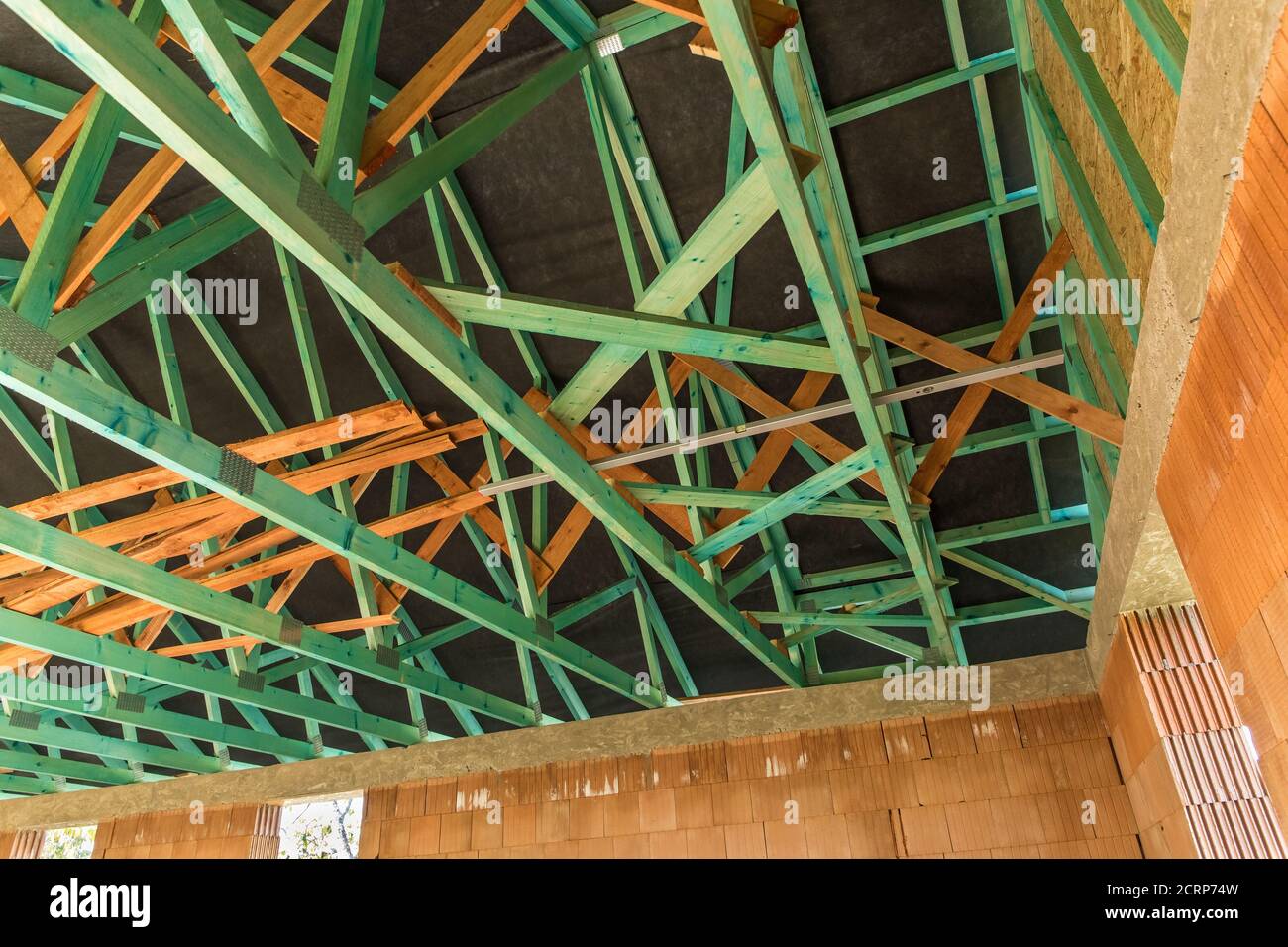 Detail of roof beams. construction of a family house. New roof. Wooden ...