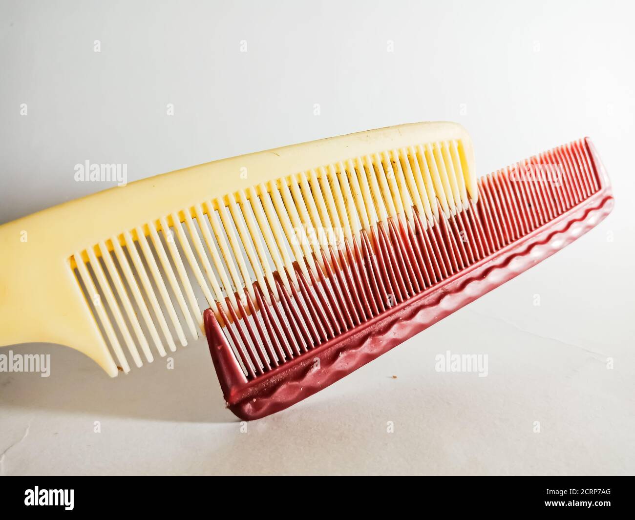 Two comb isolated on white background for marketing and branding ...