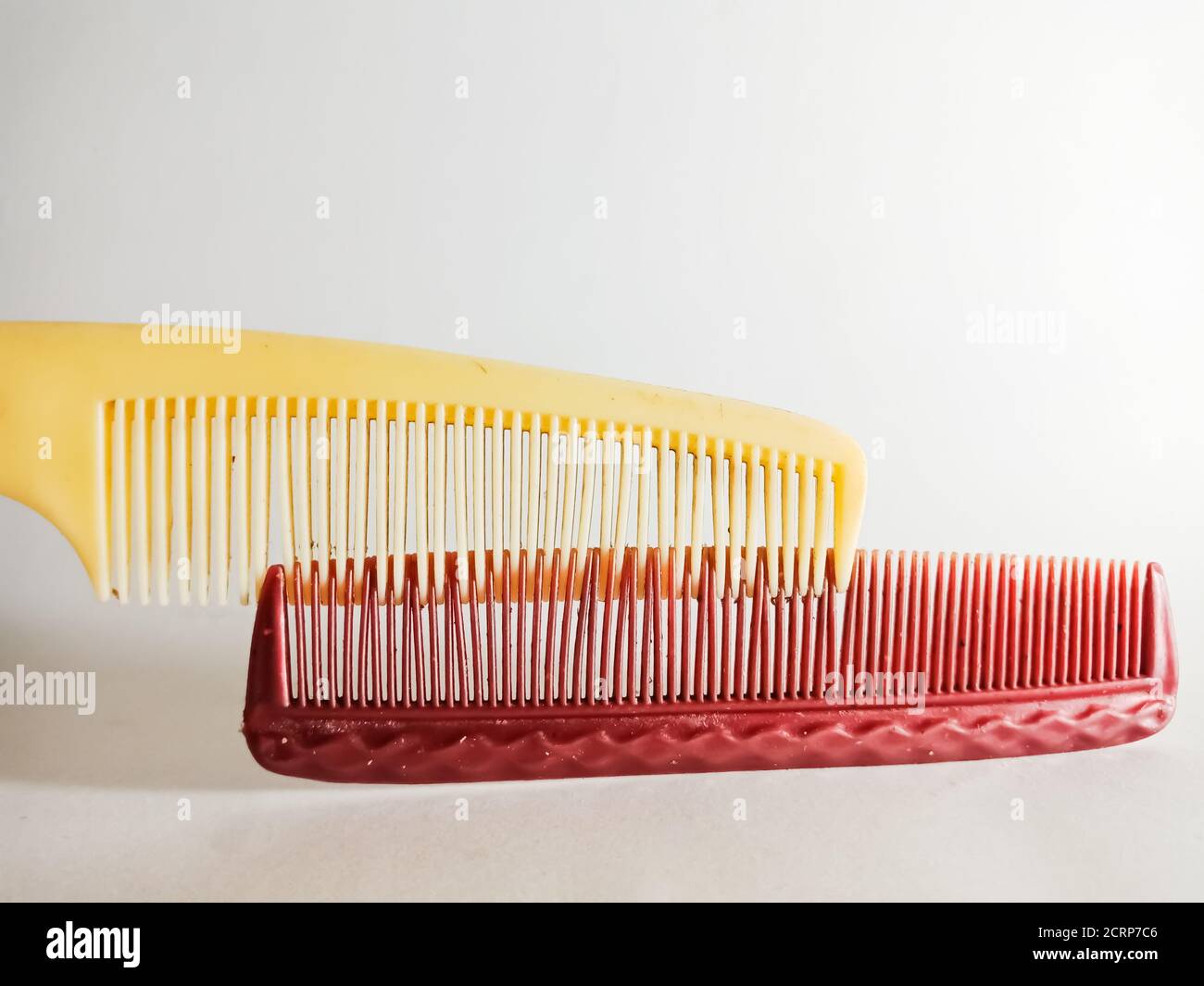 Double comb isolated on white background for marketing and branding ...