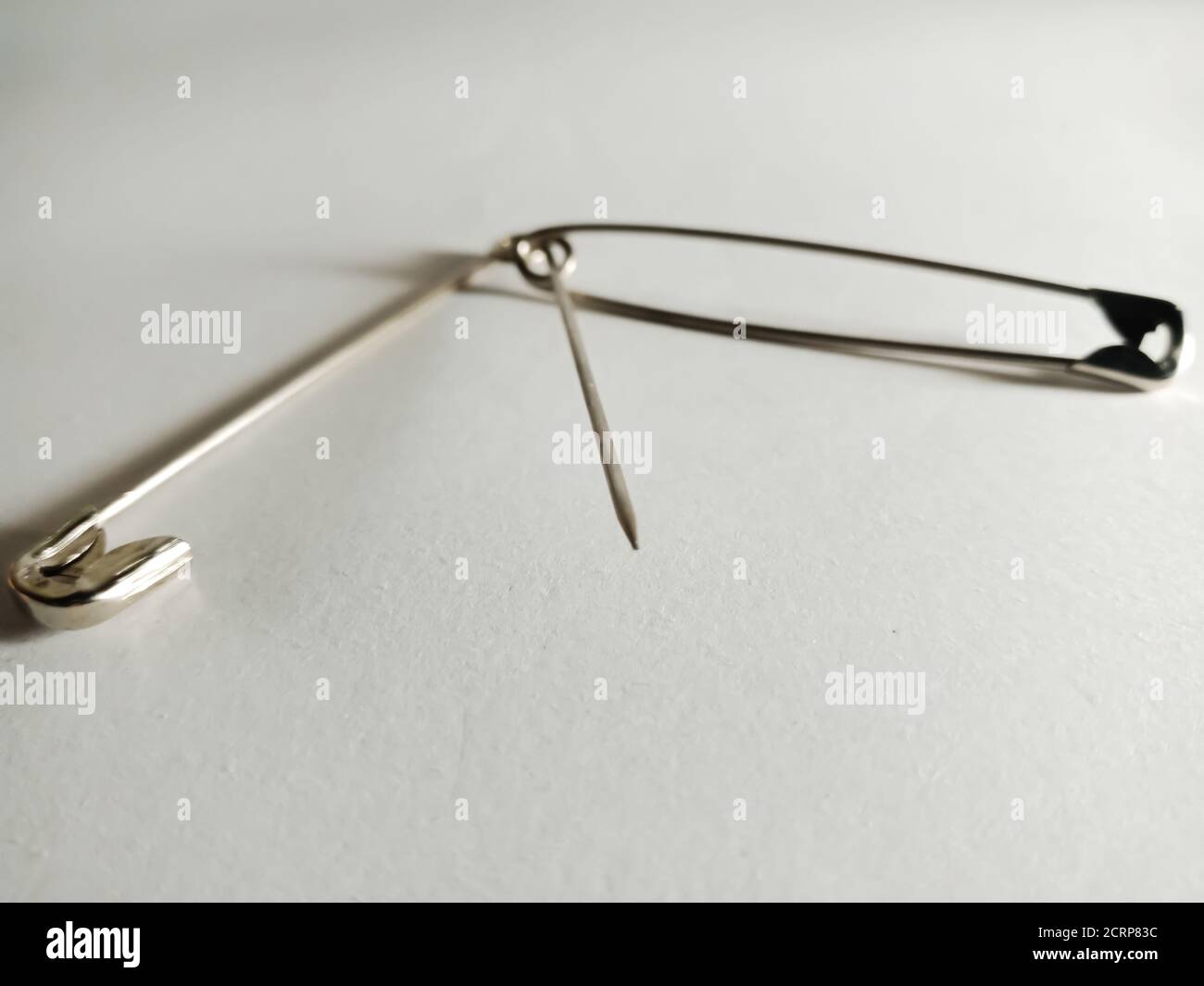 Double Safety pin isolated on white background for marketing and ...