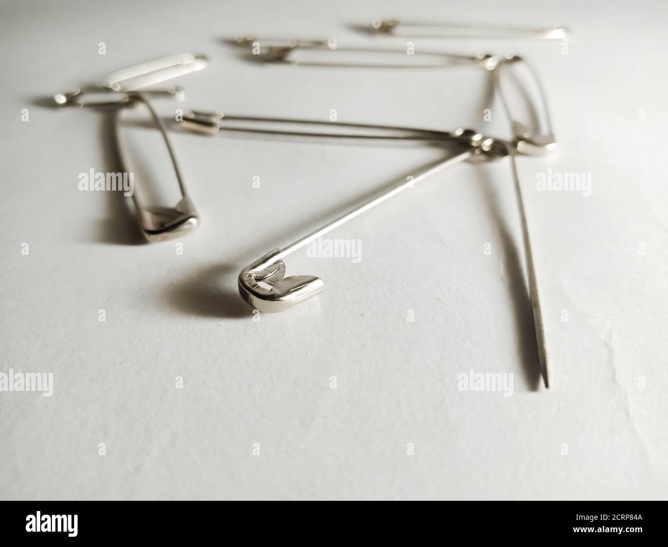 Safety pin group collection isolated on white background for marketing ...