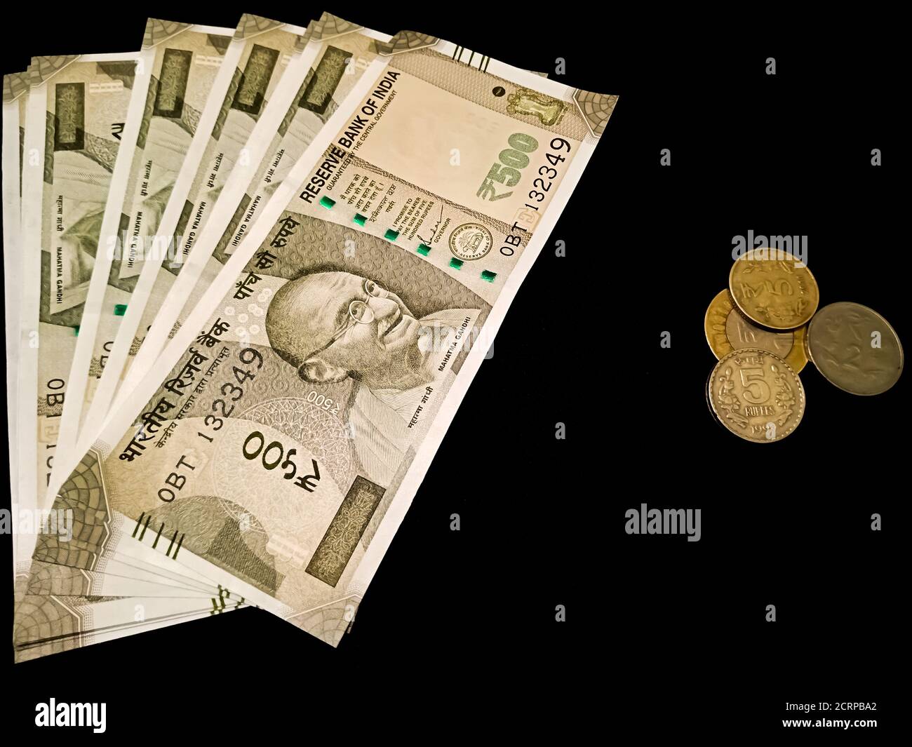 Indian currency mixed five hundred 500 rupees note isolated on black ...