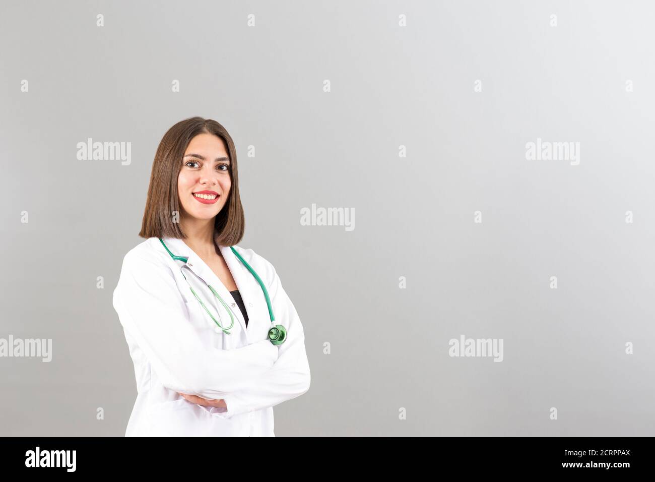 Beautiful smiling Turkish woman doctor portrait in studio she is ...
