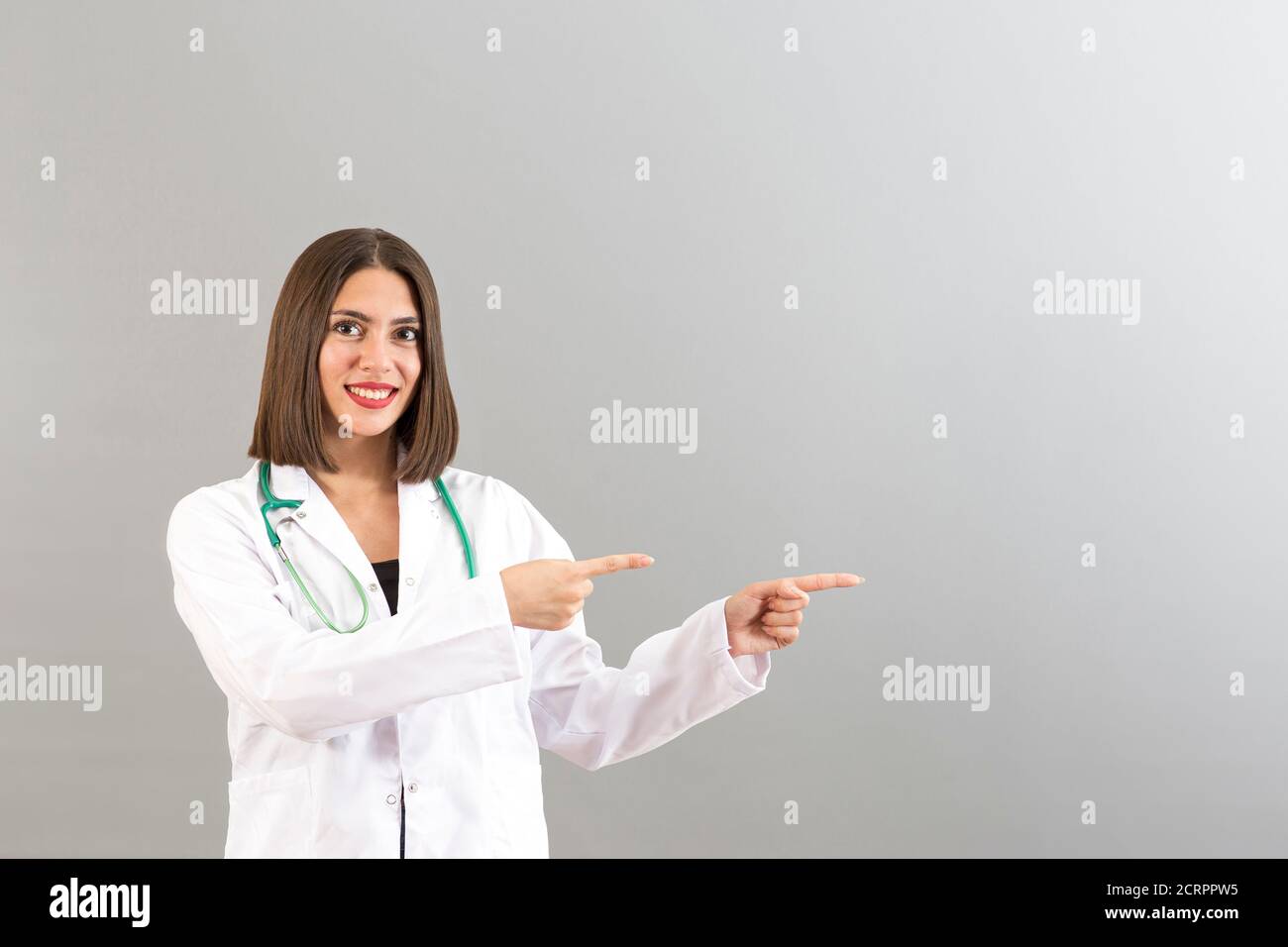 Beautiful smiling Turkish woman doctor portrait in studio she is ...