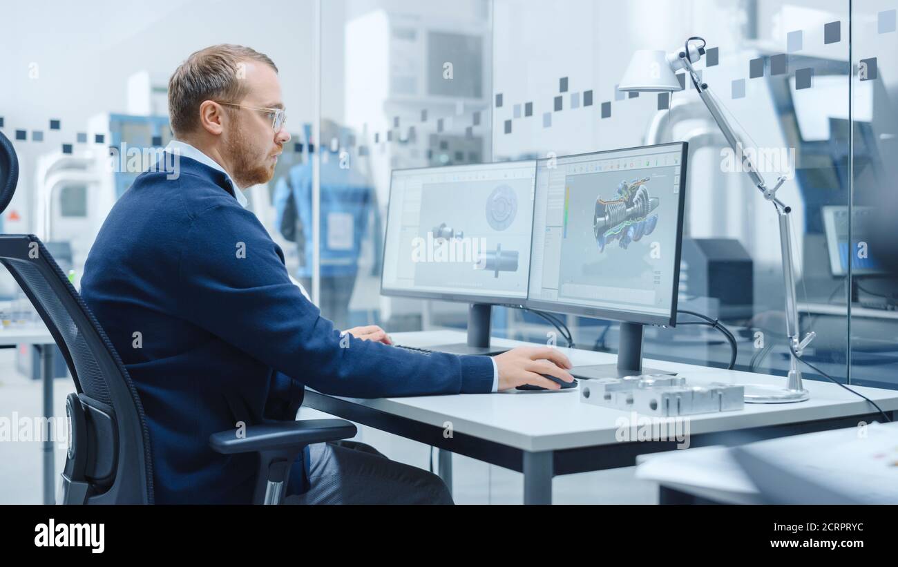 Male Industrial Engineer Solving Problems, Working on a Personal ...