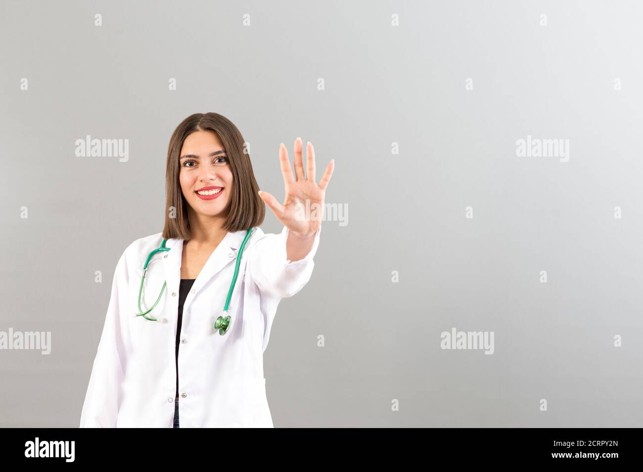 Beautiful smiling Turkish woman doctor portrait in studio she is ...
