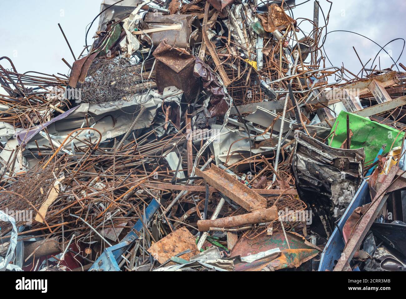 Pile of scrap metal on the garbage dump territory Stock Photo - Alamy