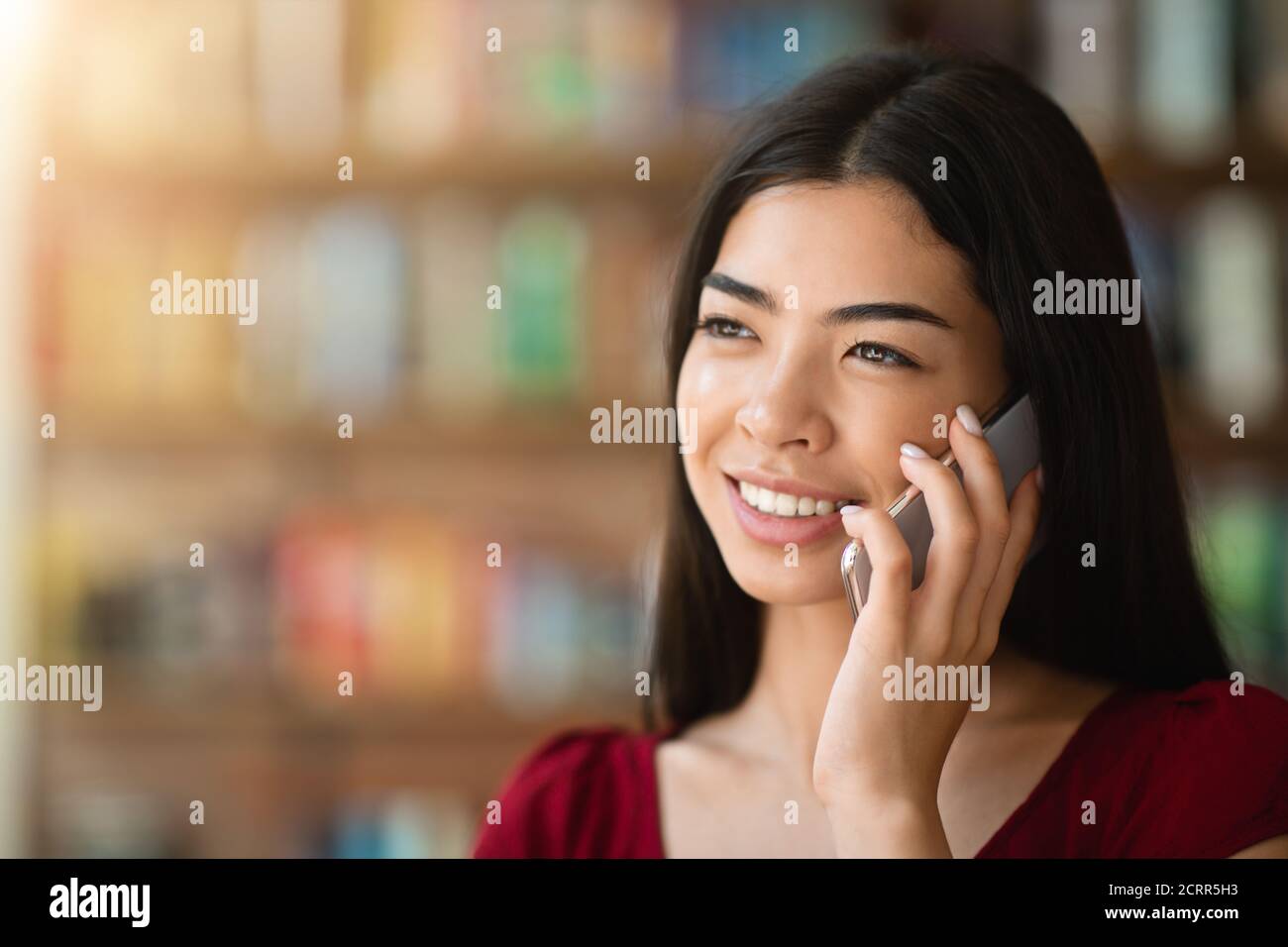 Phone Talk. Smiling Young Asian Woman Speaking With Somebody On Mobile ...