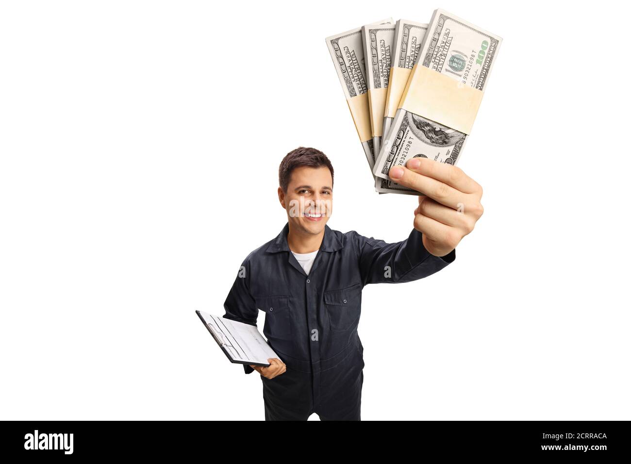 Auto mechanic worker holding money and smiling at the camera isolated ...