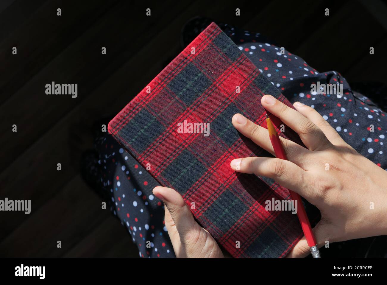 top view of women hand holding a diary Stock Photo - Alamy