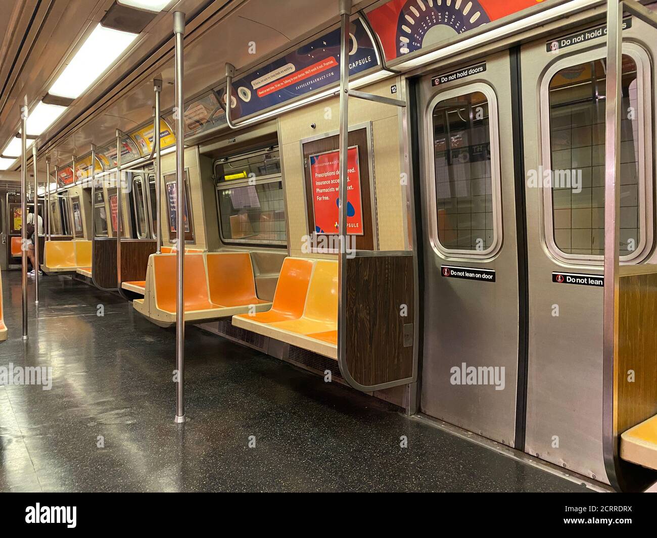 Clean and mainly empty subway train car during the Covid-19 pandemic in ...