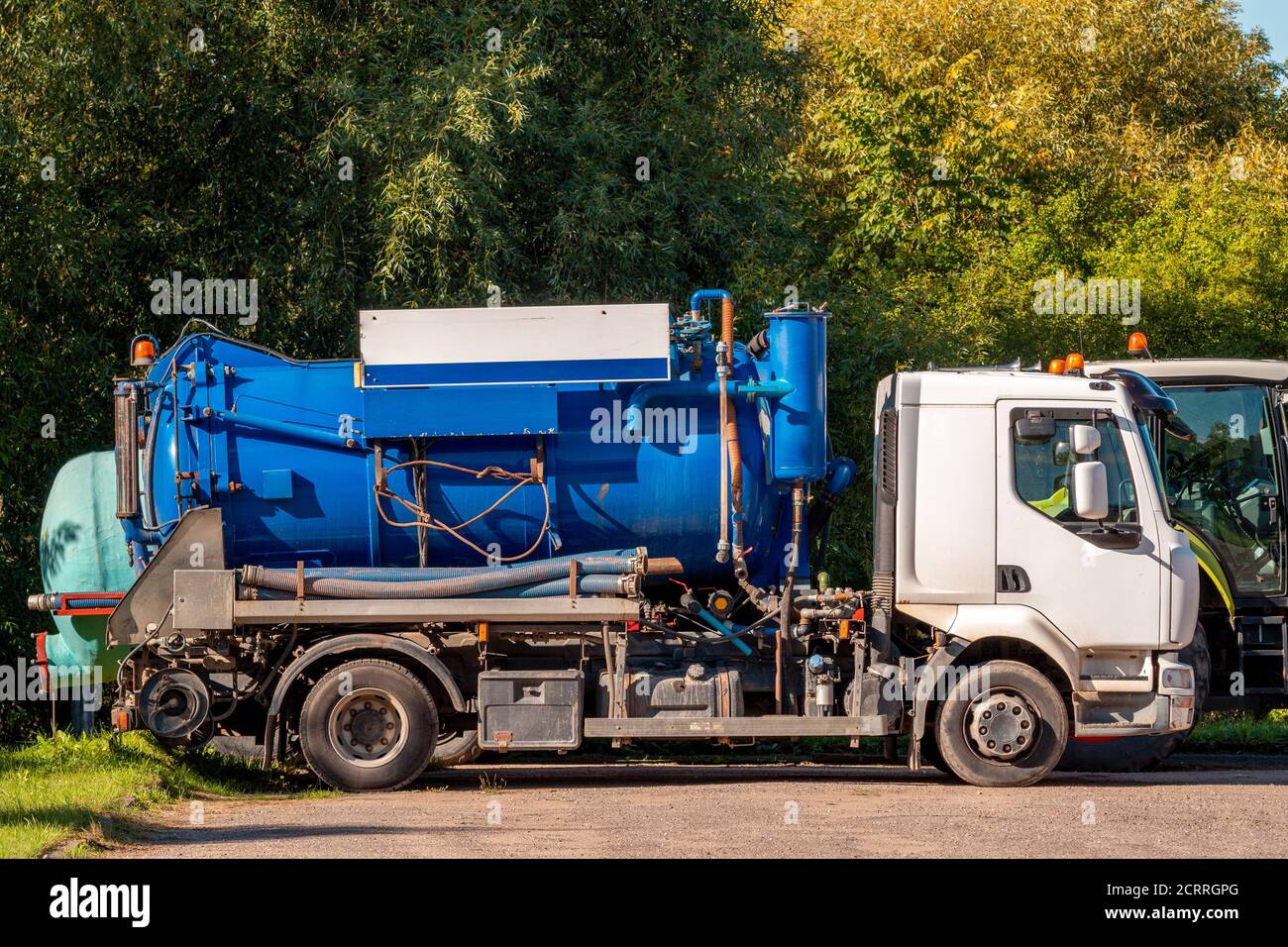 Car for cleaning the sewer system of the city Stock Photo - Alamy