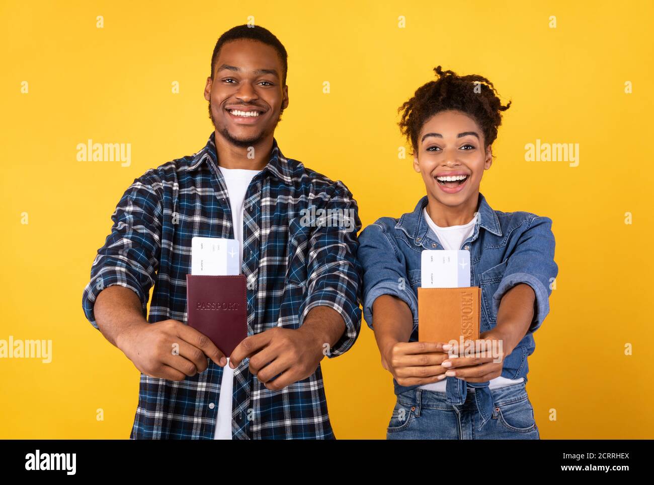 Joyful Black Couple Showing Travel Tickets Posing Over Yellow ...
