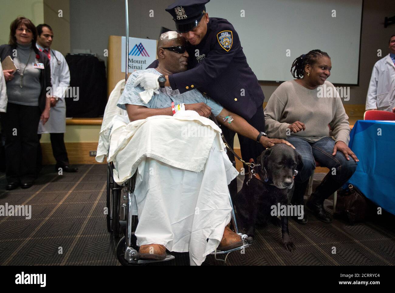 Blind person with police officer hi-res stock photography and images ...