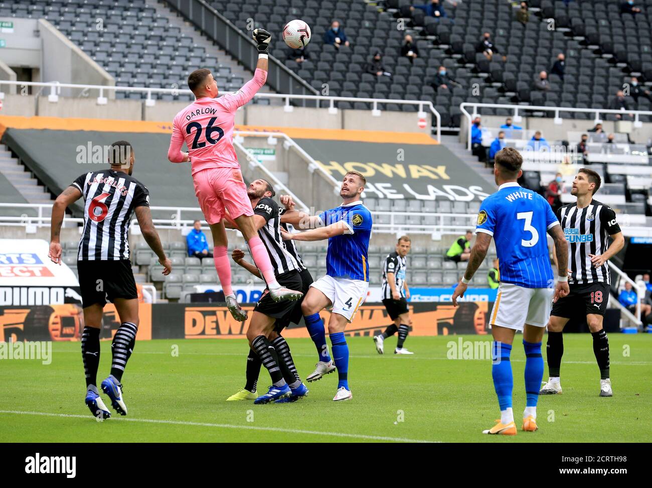 Newcastle United goalkeeper Karl Darlow (second left) clears the ball ...