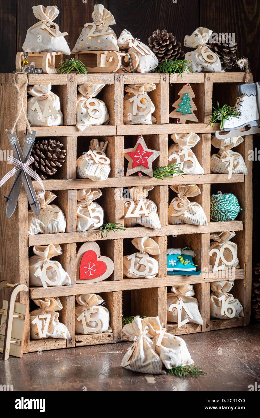 Original Advent Calendar for Christmas in an old wooden boxon dark ...