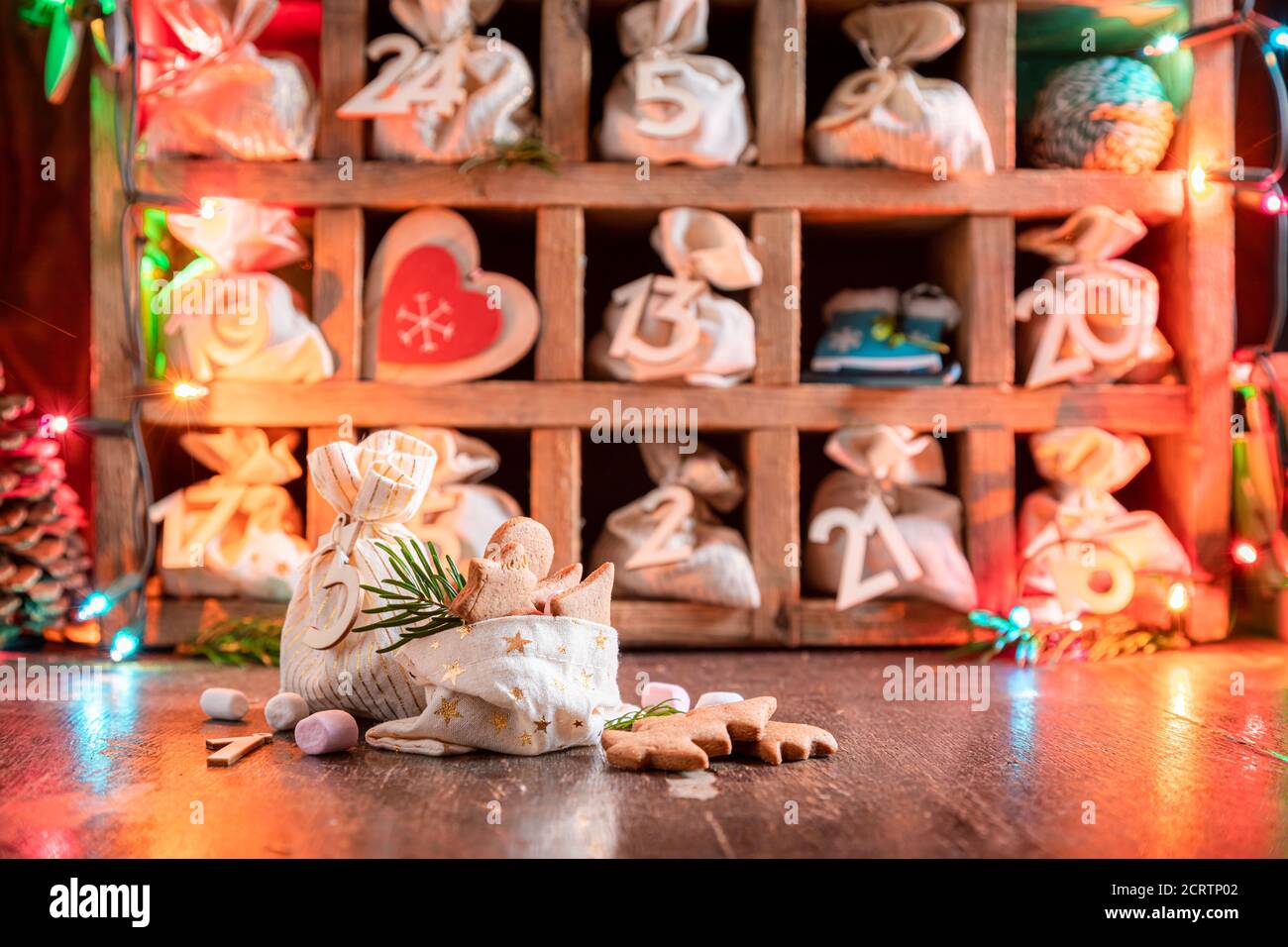 Original Advent Calendar for Christmas made of bags and stringon dark ...