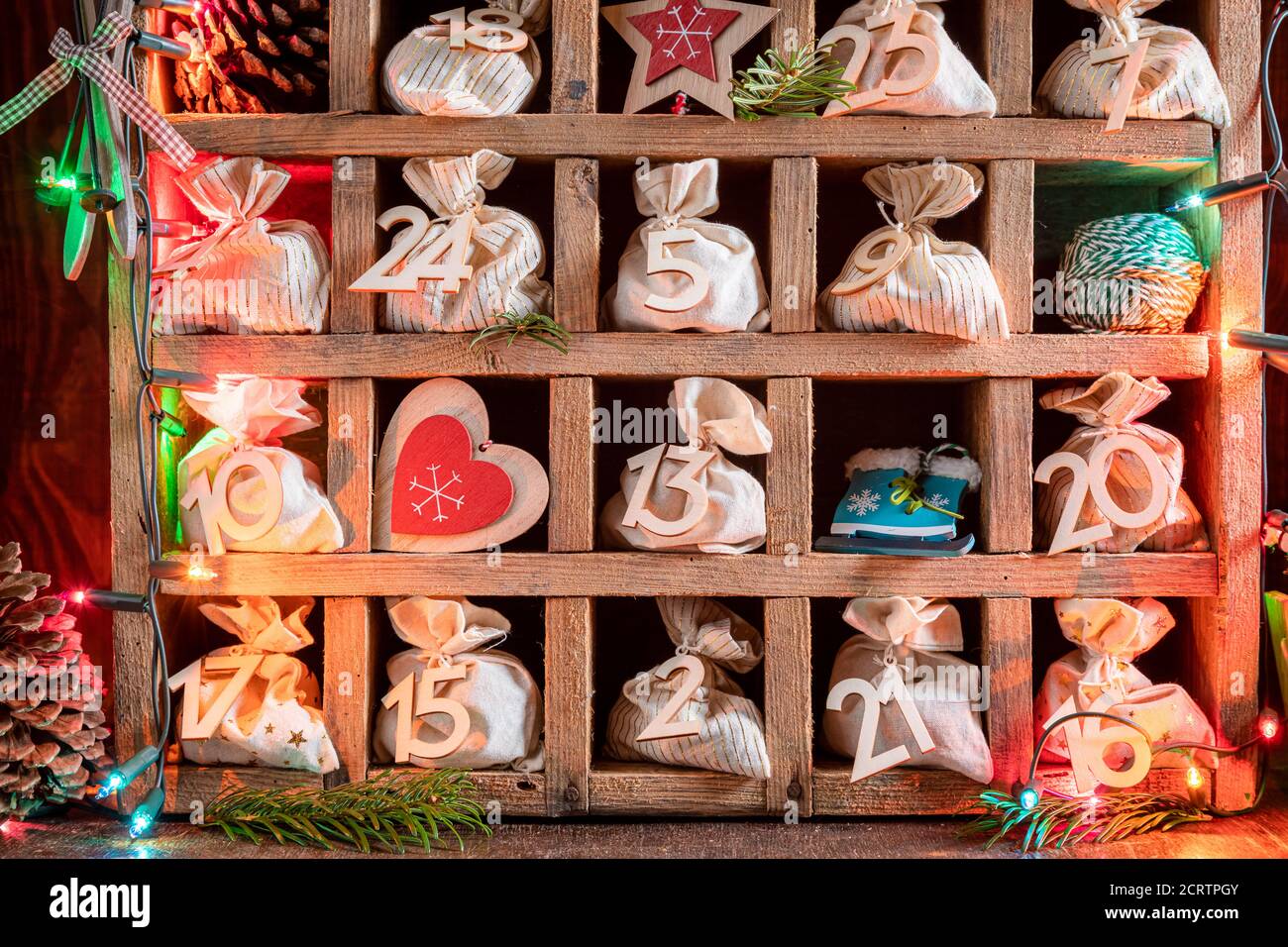 Unique Advent Calendar for Christmas in an old wooden boxon dark ...
