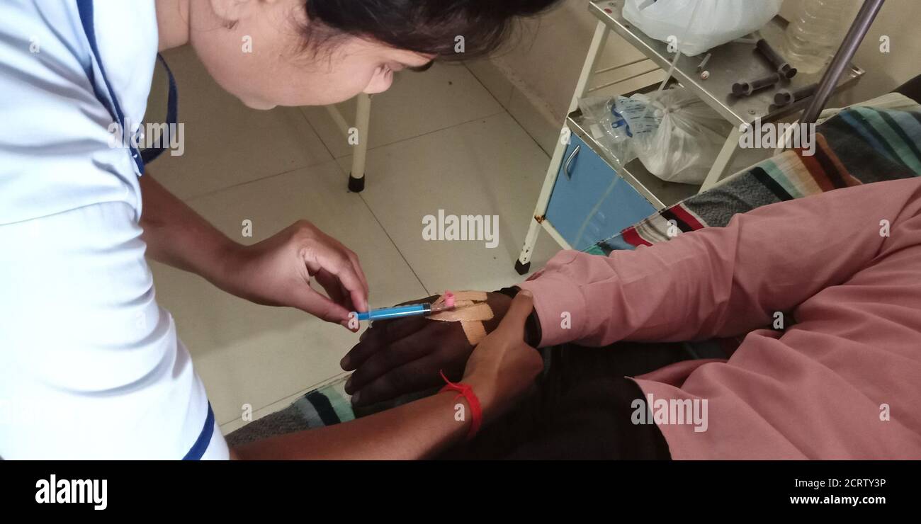 DISTRICT KATNI, INDIA - SEPTEMBER 28, 2019: An indian lady doctor ...