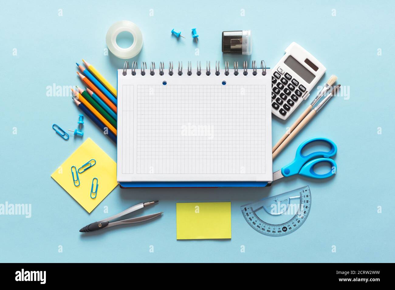Back to school, stationery on blue background. Image with copy space ...