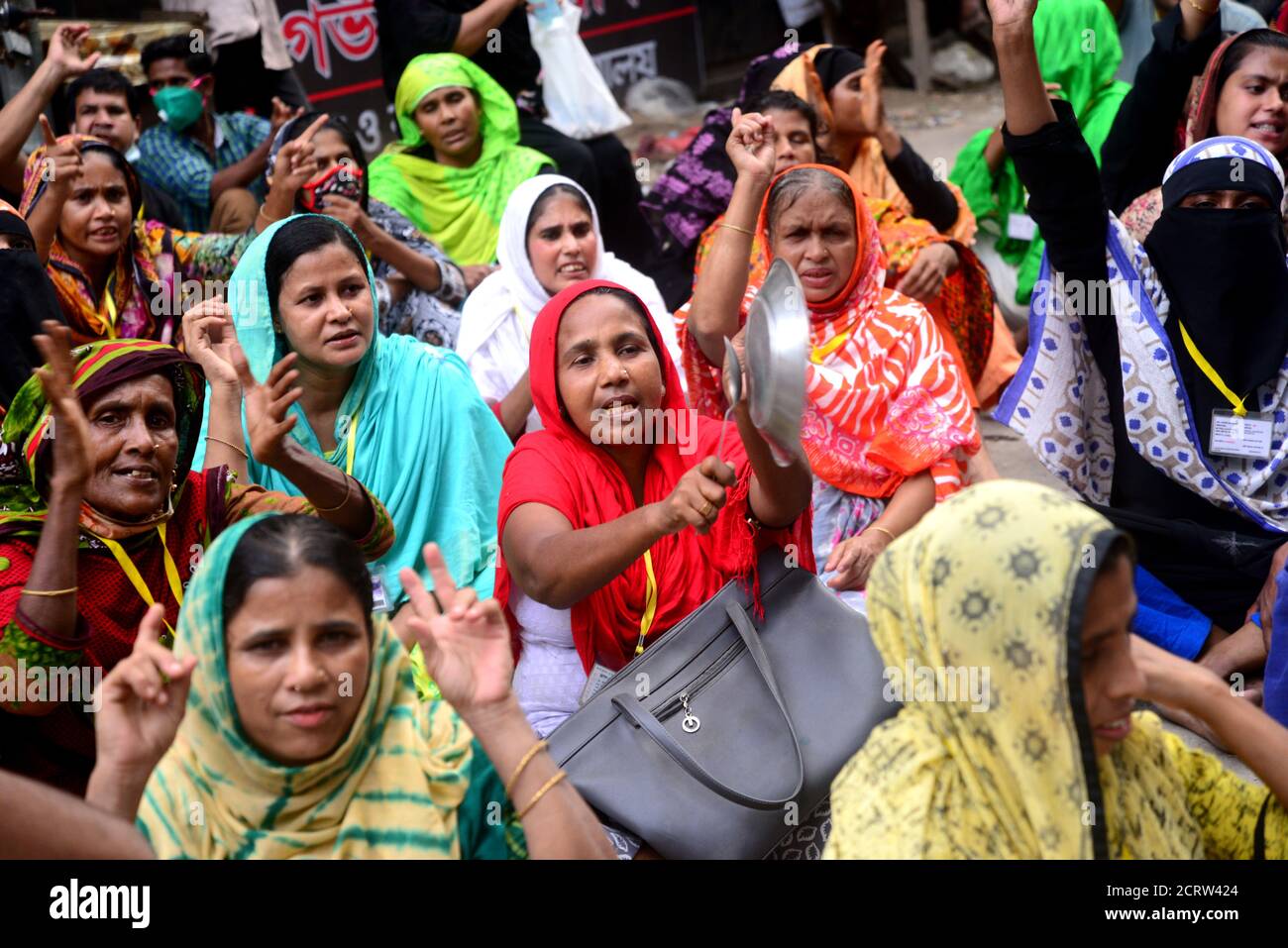 Garments workers of Dragon Group stage a demonstration in front of ...