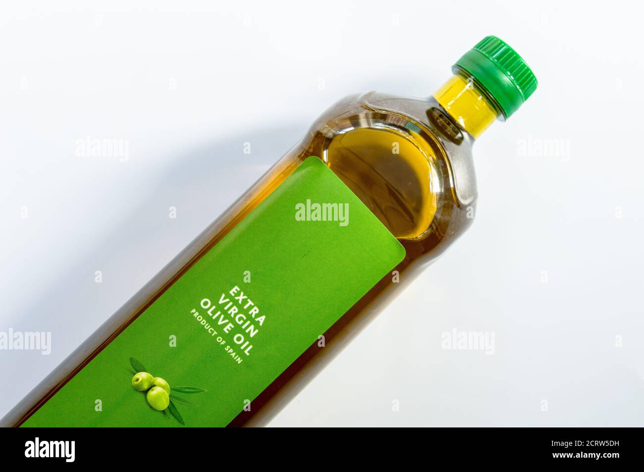 Extra virgin Olive oil in a plastic bottle with sealed cap on white ...