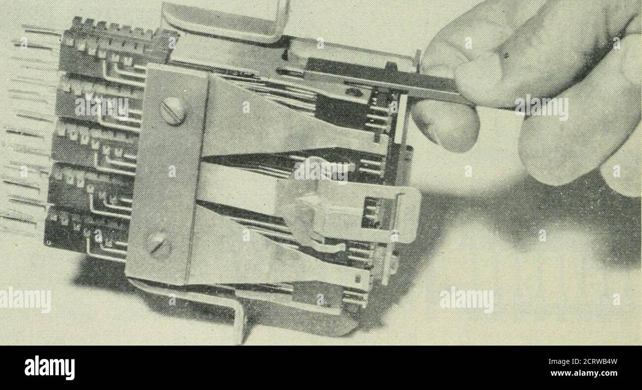 . The Bell System technical journal . Fig. 10 — New 30-contact relays ...