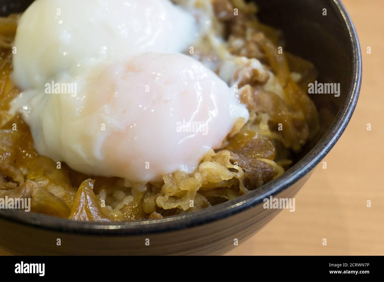 Japanese beef and hot spring egg on rice bowl Stock Photo - Alamy