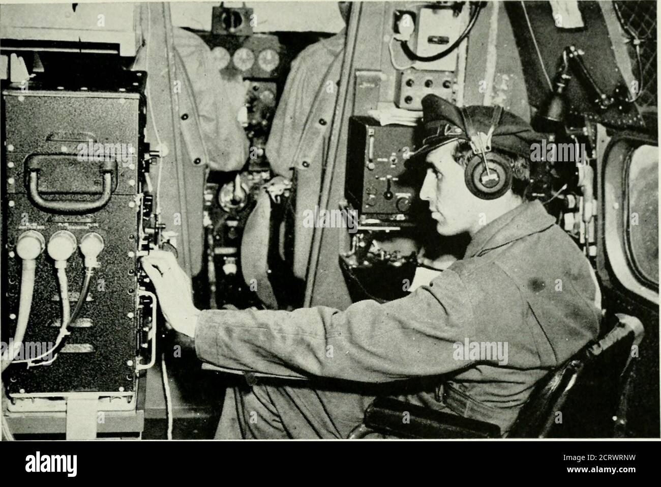 . Bell telephone magazine . Ax air-borne radio operator keeps in touch ...