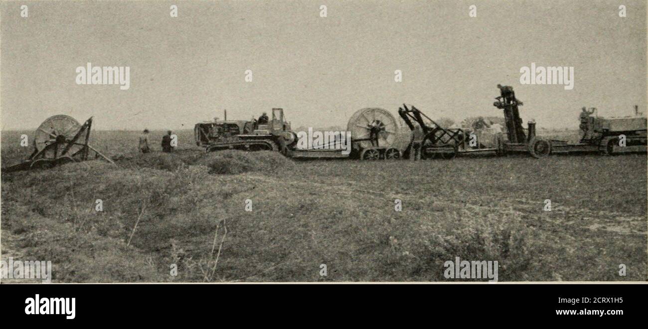 Bell telephone magazine cable plow hi-res stock photography and images ...