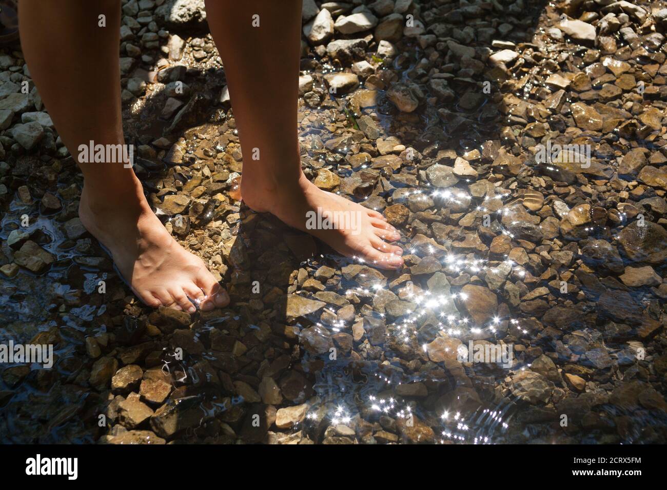 Small feet in stream of water hi-res stock photography and images - Alamy