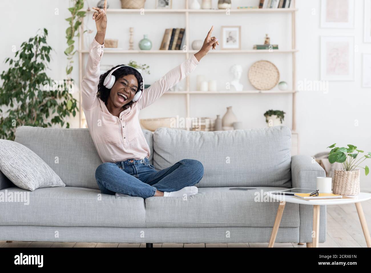 Woman listening songs in hi-res stock photography and images - Alamy