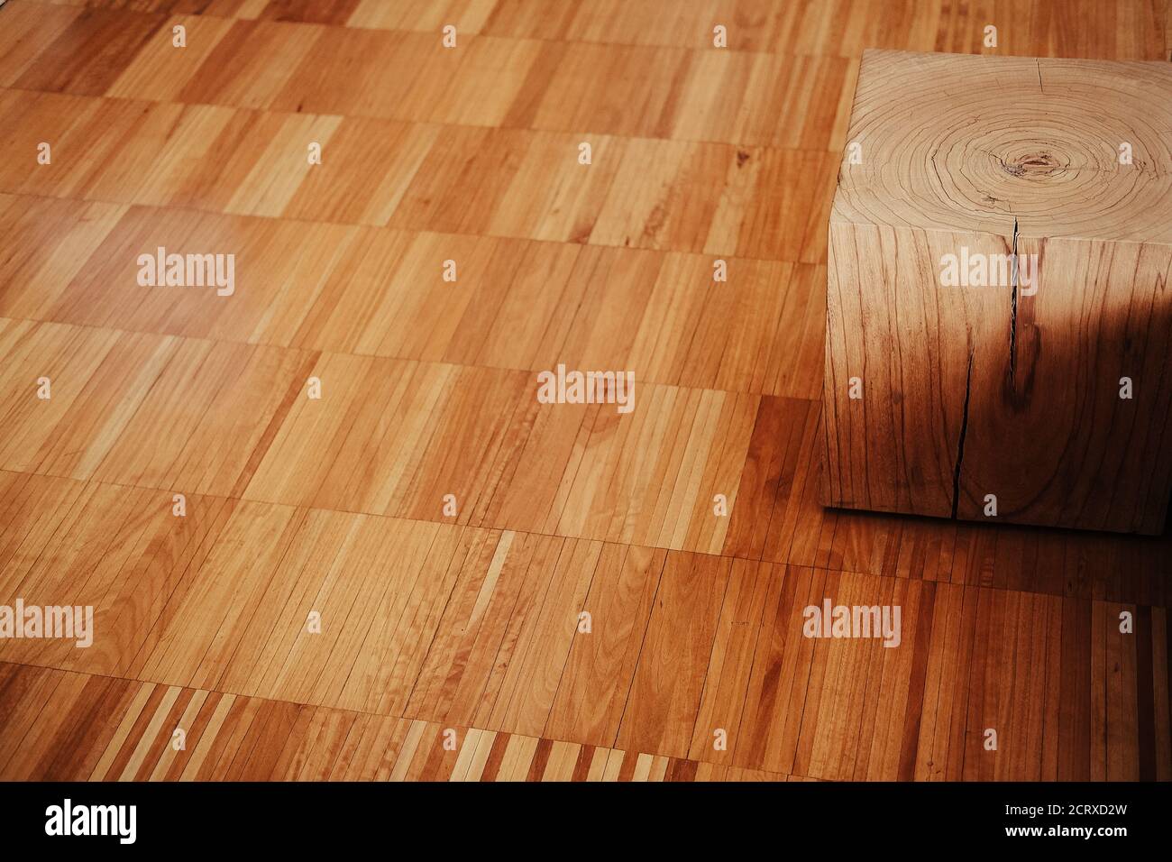 Parquet flooring and a square cut wood Stock Photo - Alamy
