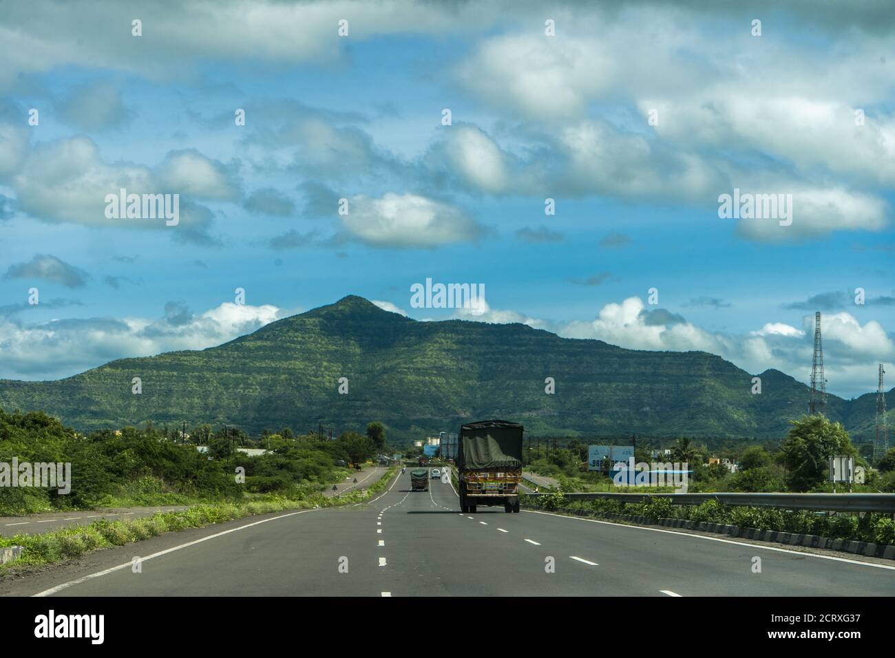 Big highway on a beautiful mountain background Stock Photo - Alamy