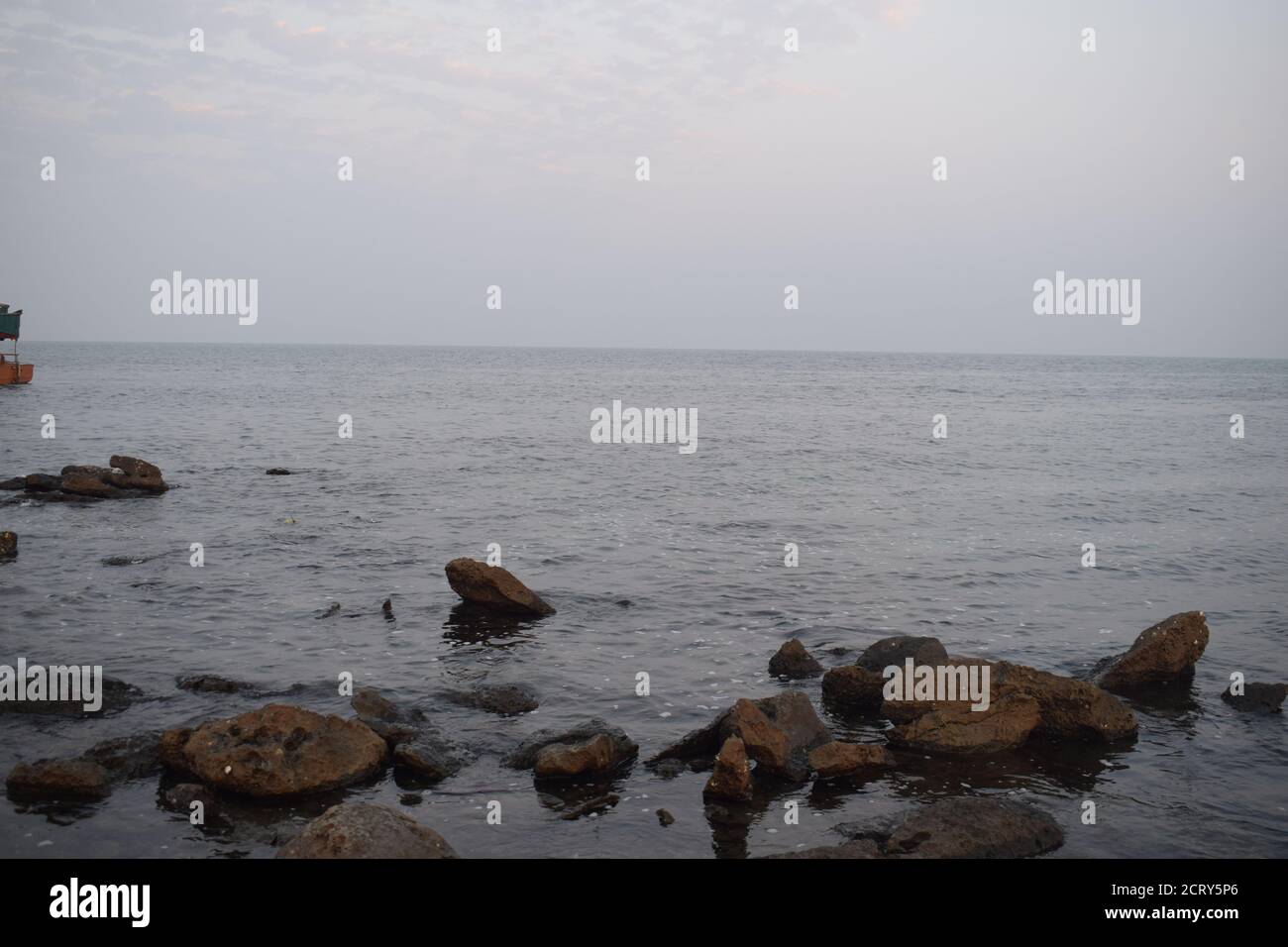stone on sea shore Stock Photo - Alamy