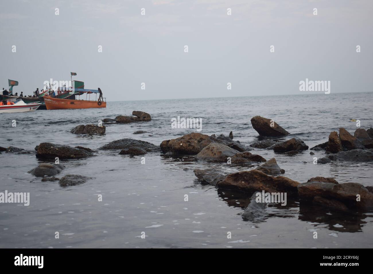 stone on sea shore Stock Photo - Alamy