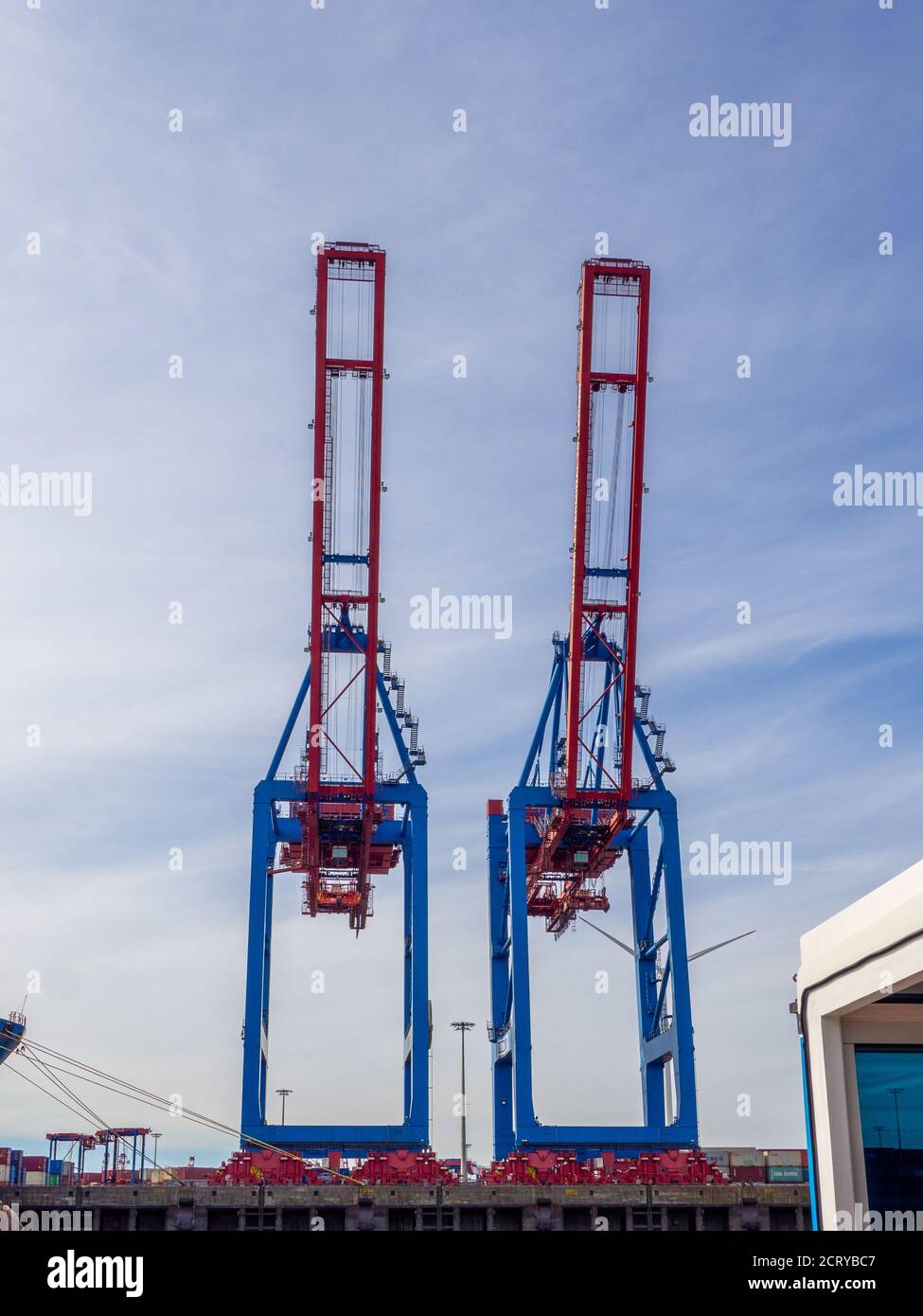 in a port there are cranes for loading and unloading ships Stock Photo ...