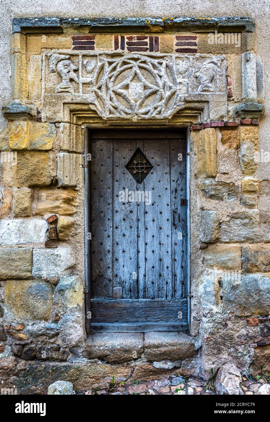 Medieval doorway and carved stone header in Saint-Benoit-du-Sault ...