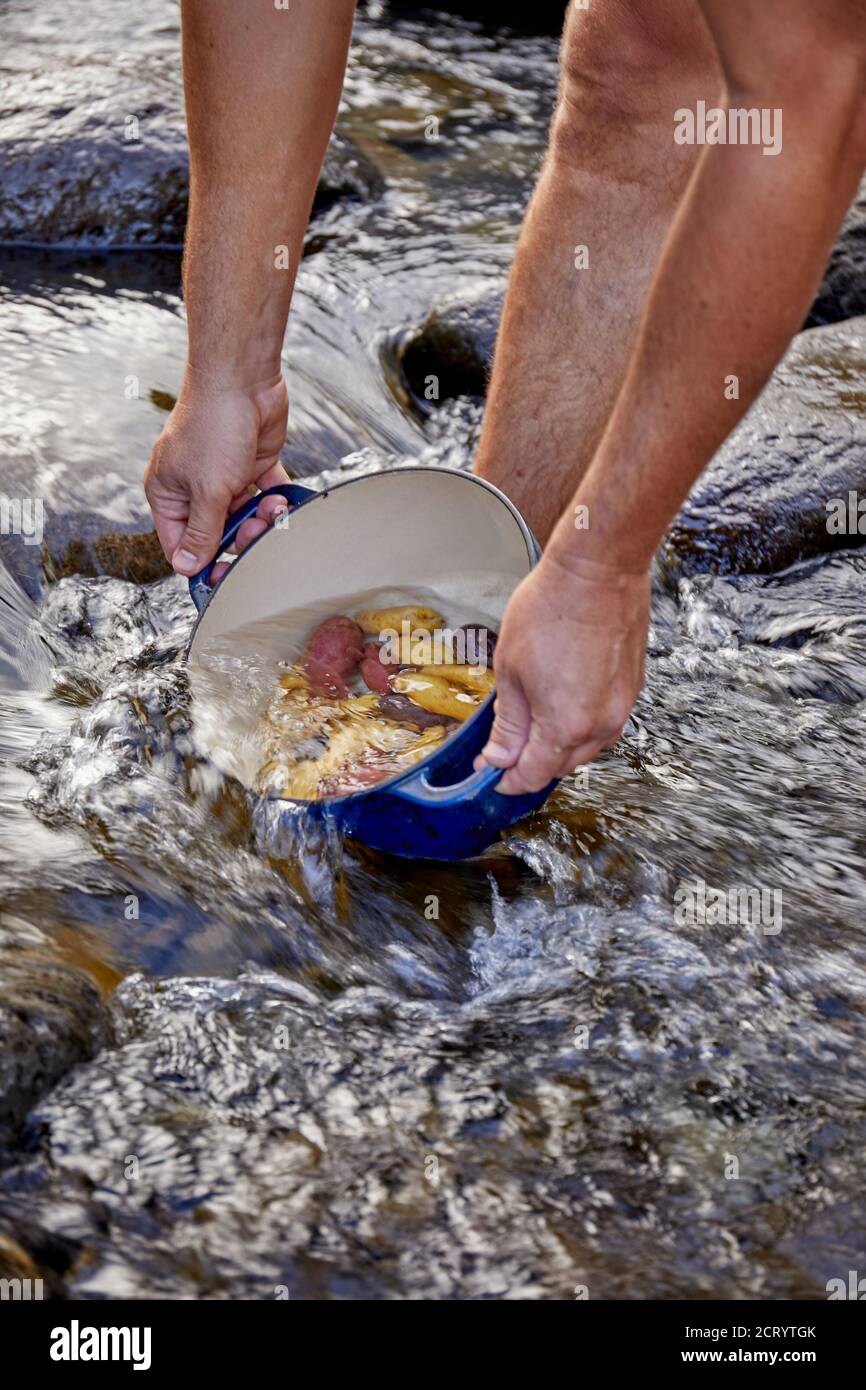 Filling water pot hi-res stock photography and images - Alamy