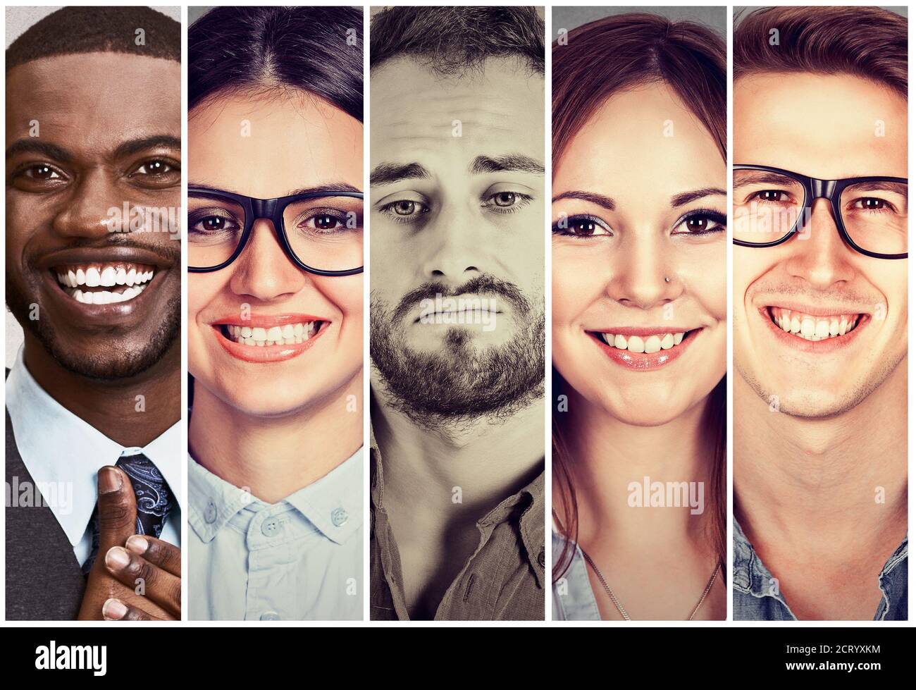 Sad young man in the middle of a happy group of people women and men ...