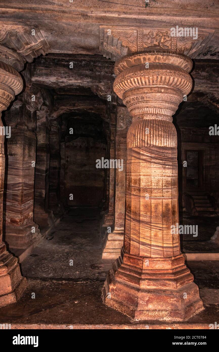 badami cave temple interior pillars stone art in details image is taken ...