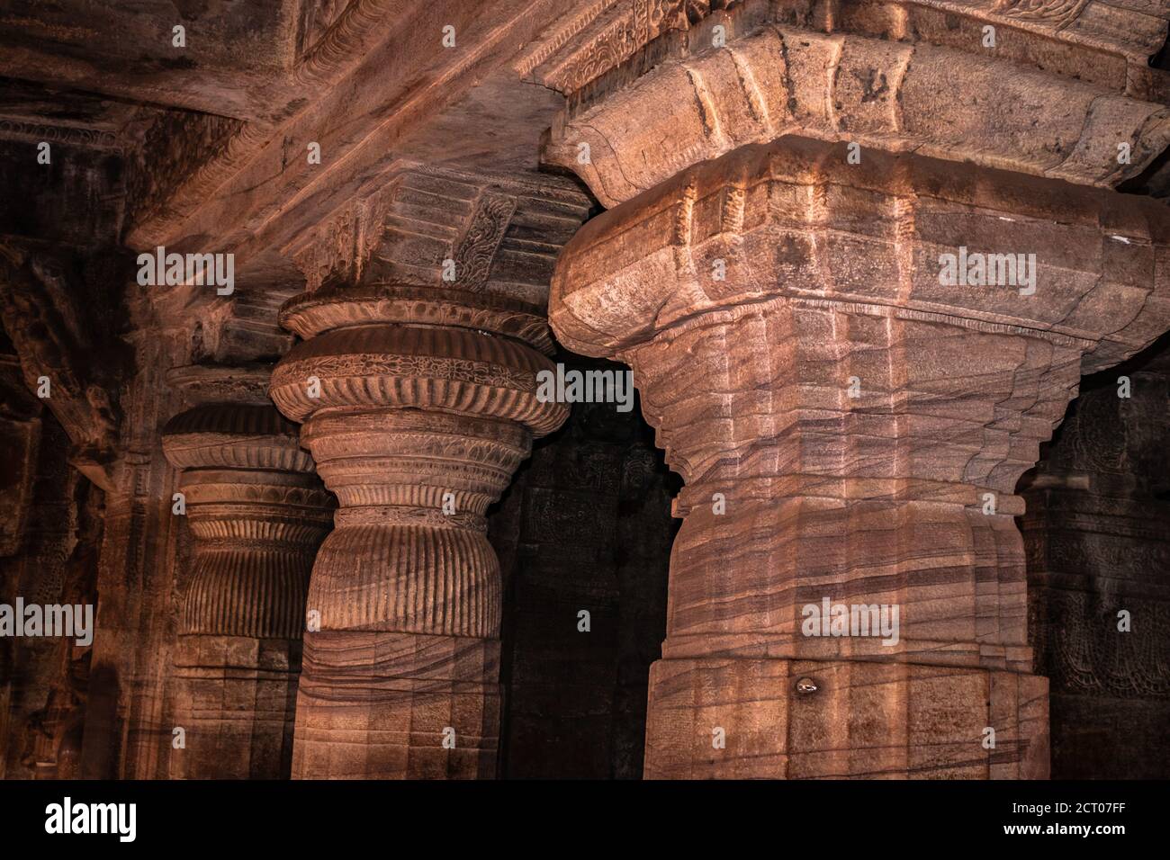 badami cave temple interior pillars stone art in details image is taken ...