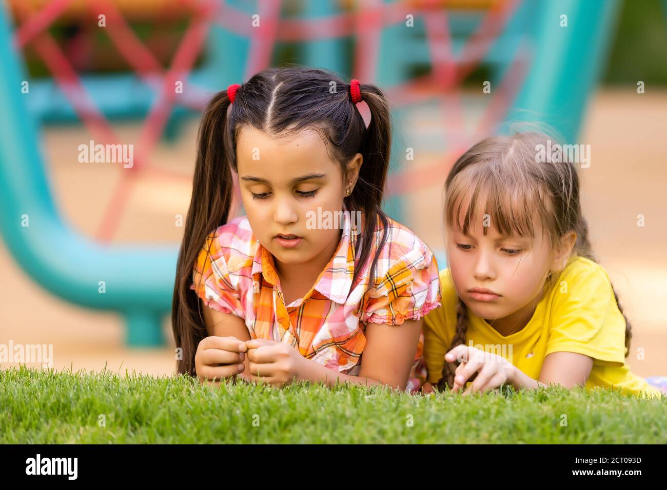 Happy children playing outdoors, children on the playground Stock Photo ...